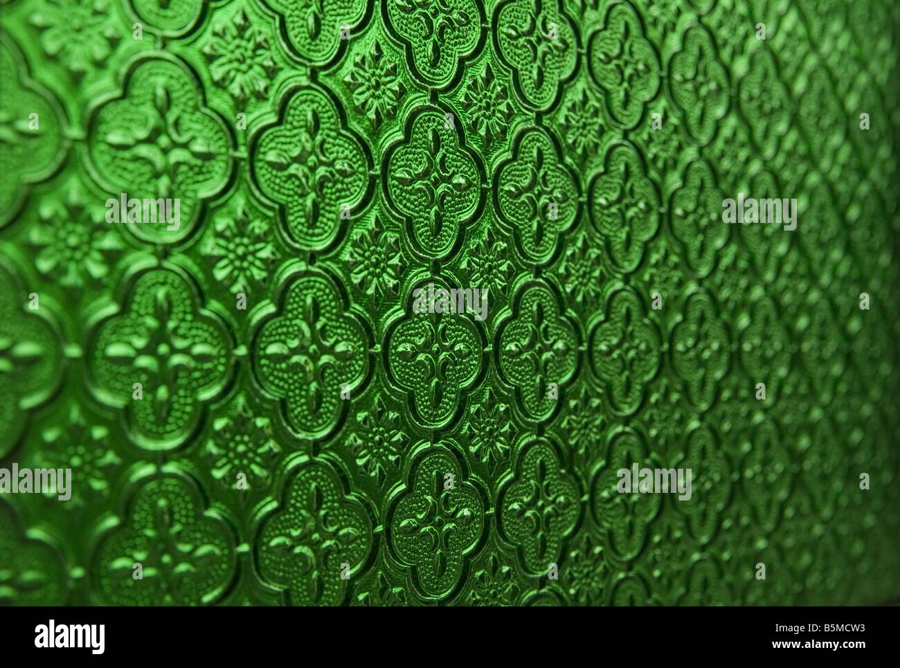 Green patterned glass panel Stock Photo - Alamy