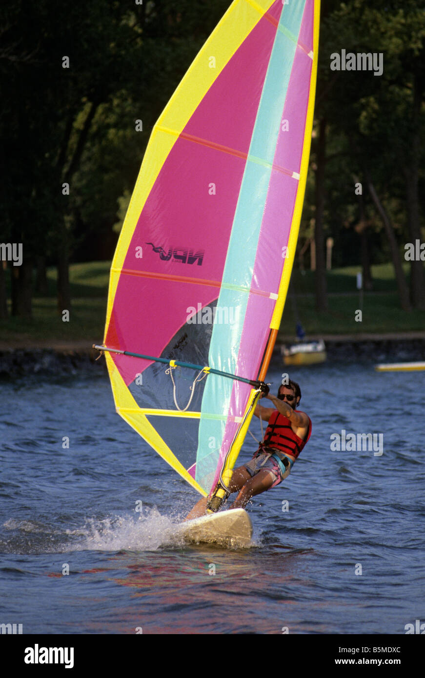 WINDSURFER ON LAKE CALHOUN IN THE HEART OF MINNEAPOLIS, MINNESOTA ...