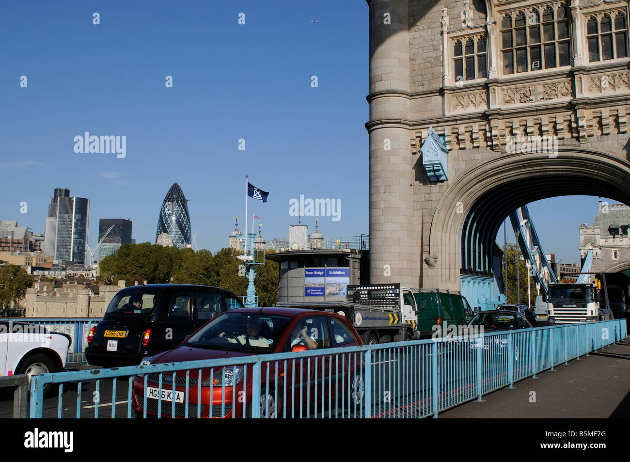 Traffic on Tower Bridge London UK Stock Photo - Alamy