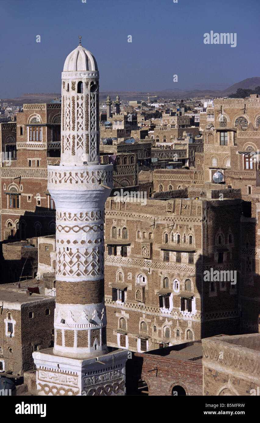 Adobe or Mud Tower Houses and Minaret of Saba Mosque with Abstract ...