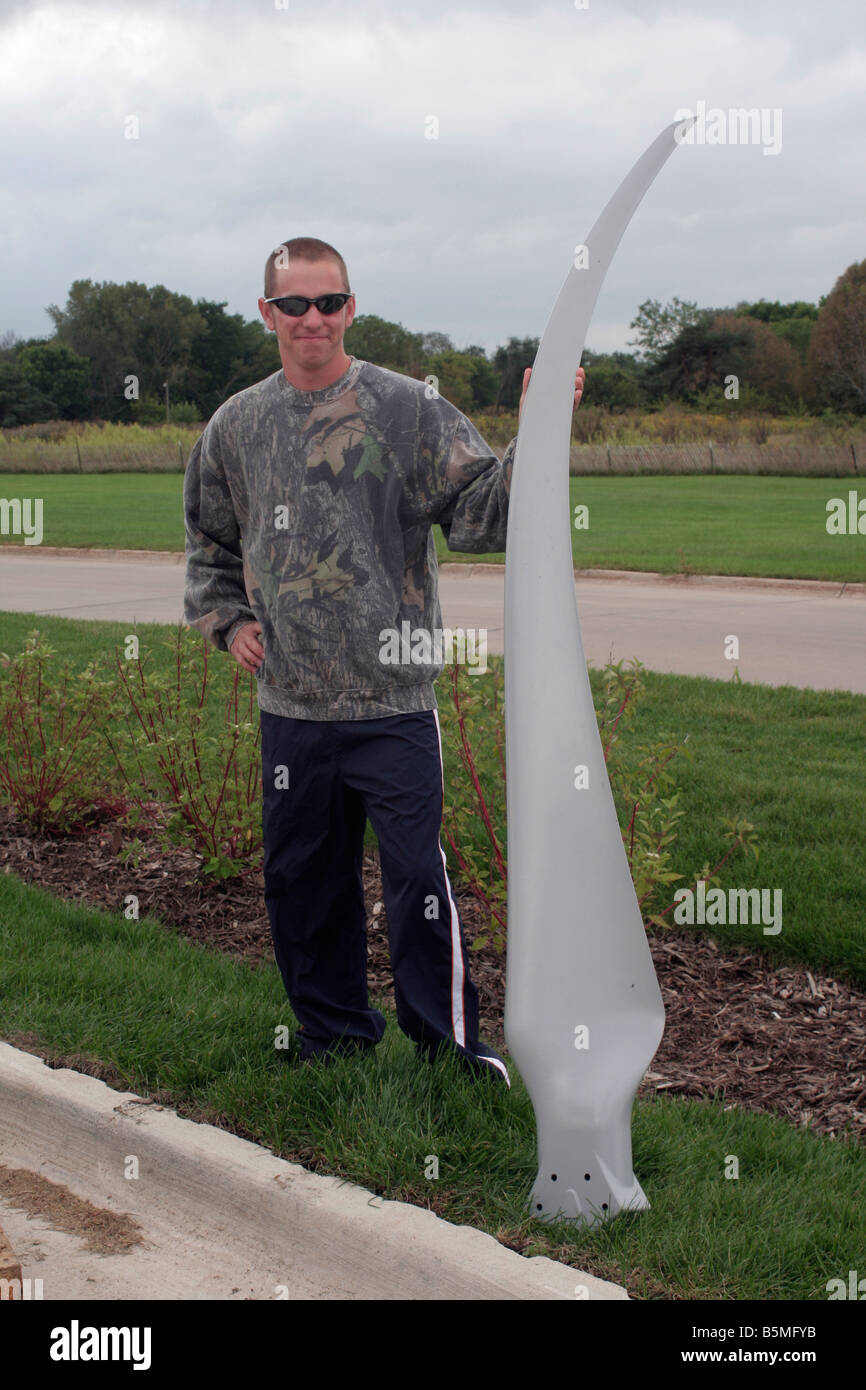 Scimitar shaped blade from an alternative energy wind generator Stock ...