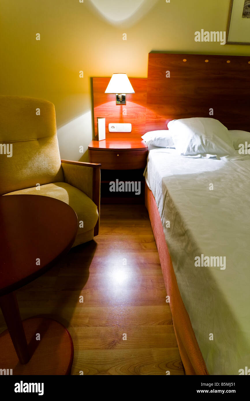 Hotel room furniture wide angle vertical composition Stock Photo - Alamy