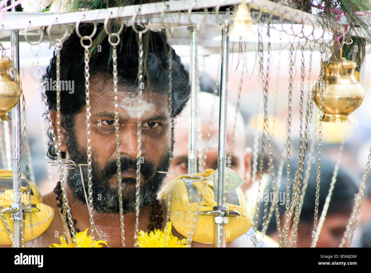 penitent with pierced cheeks during thaipusam festival, batu caves ...