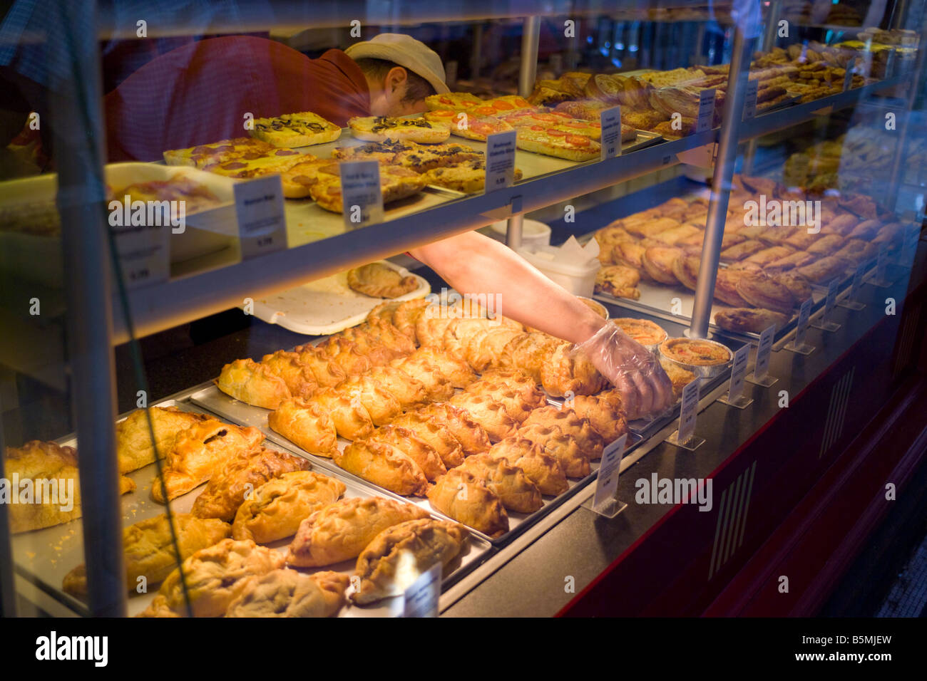 Pies in pie shop window Stock Photo - Alamy