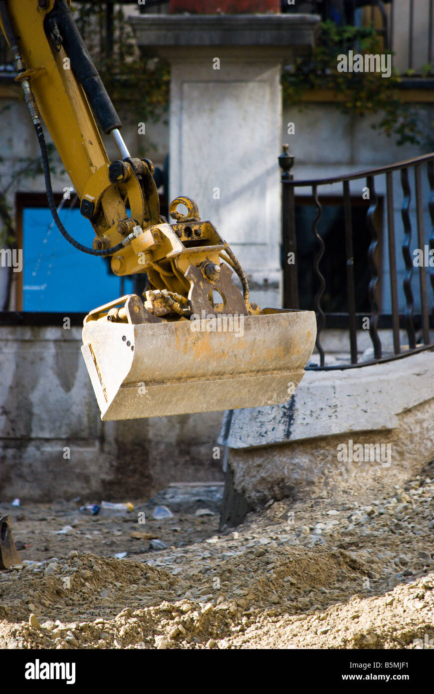 Bucket of a small back-hoe Stock Photo - Alamy