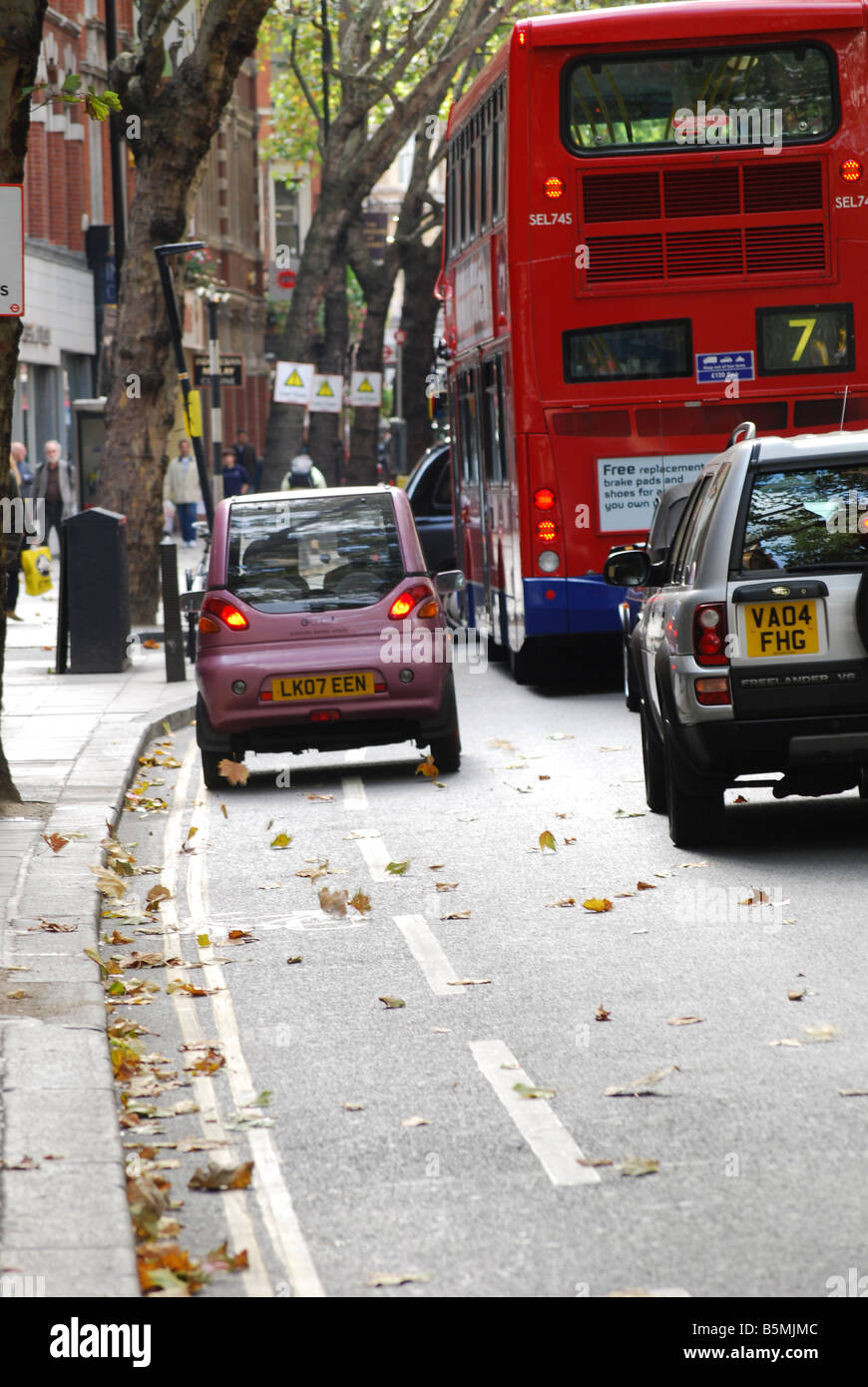 Car in Cycle lane London Bus cars Stock Photo - Alamy