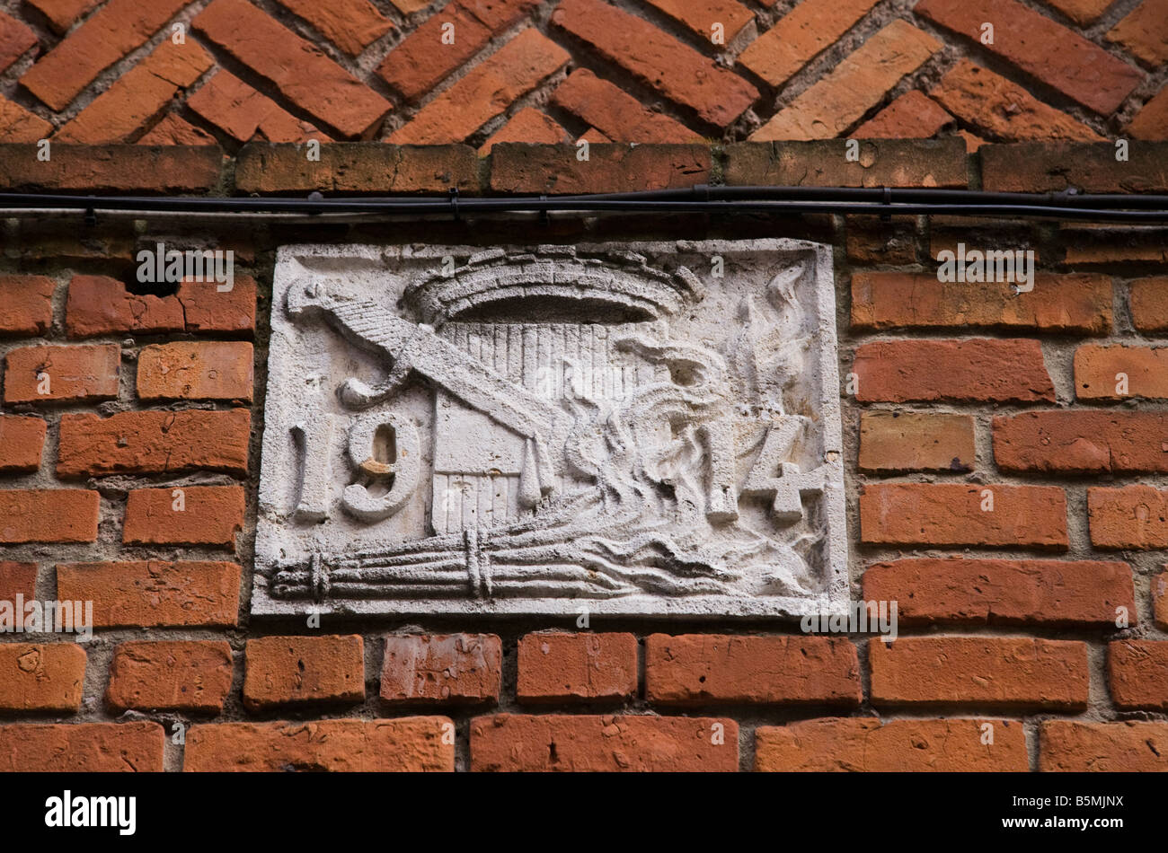 Date plaque on a building in Leuven, Belgium, that was built in 1914 ...
