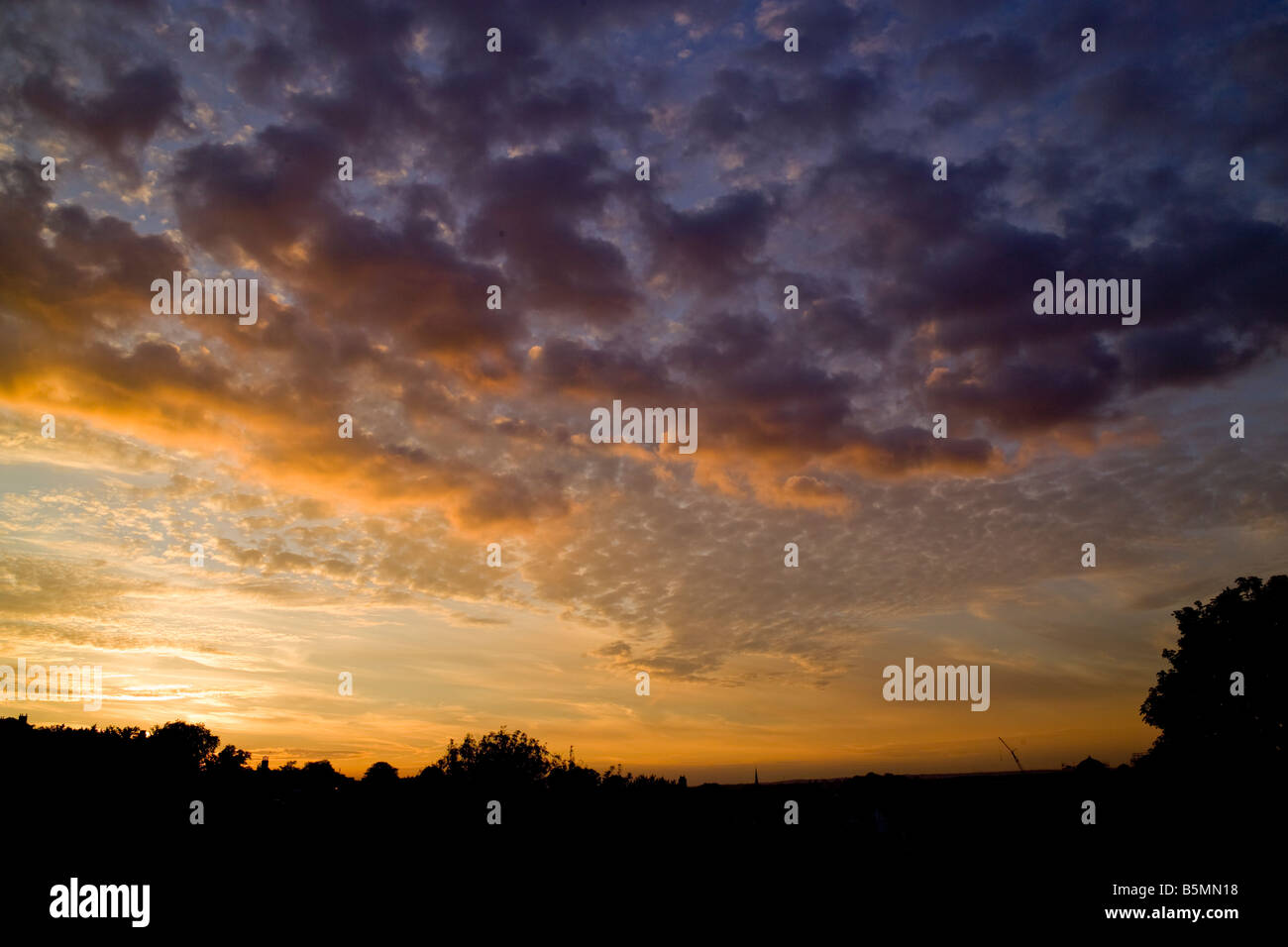 Clouds at sunset Stock Photo - Alamy