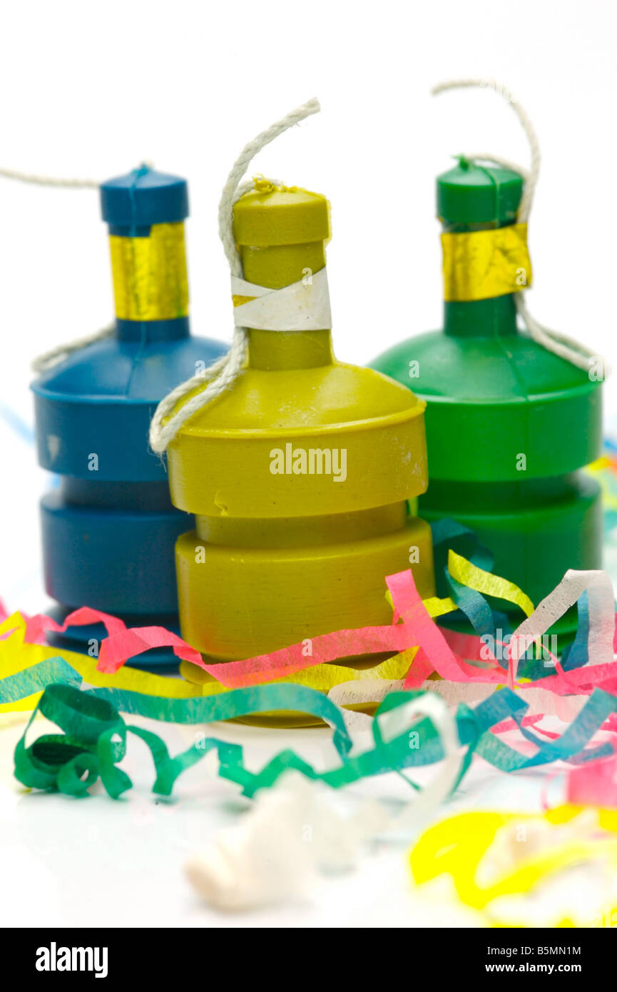 Party poppers isolated against a white background Stock Photo - Alamy