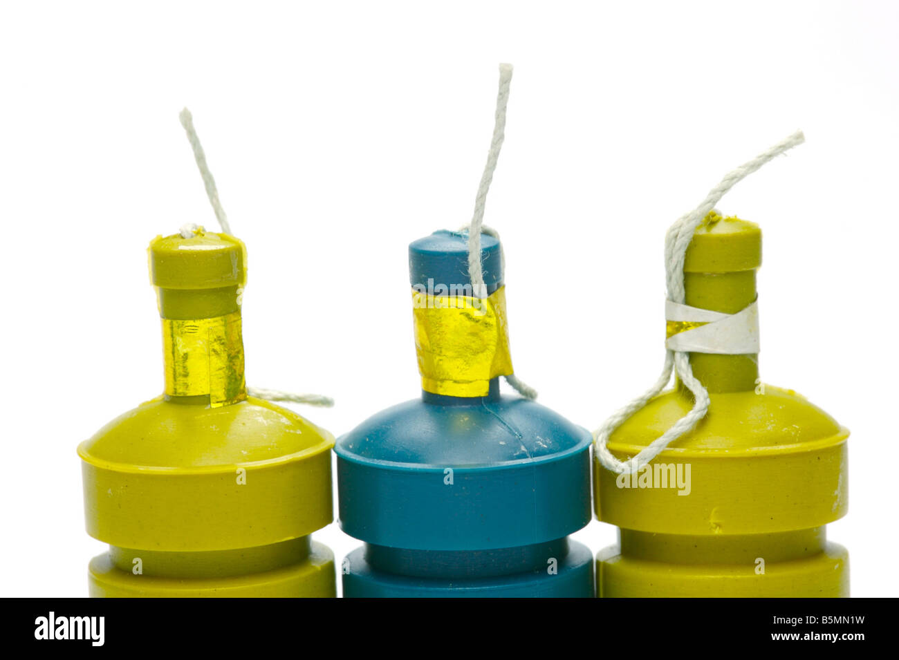 Party poppers isolated against a white background Stock Photo - Alamy