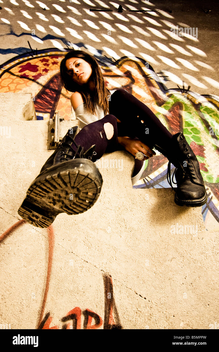 Rebel young girl posing in her hiding place Stock Photo - Alamy