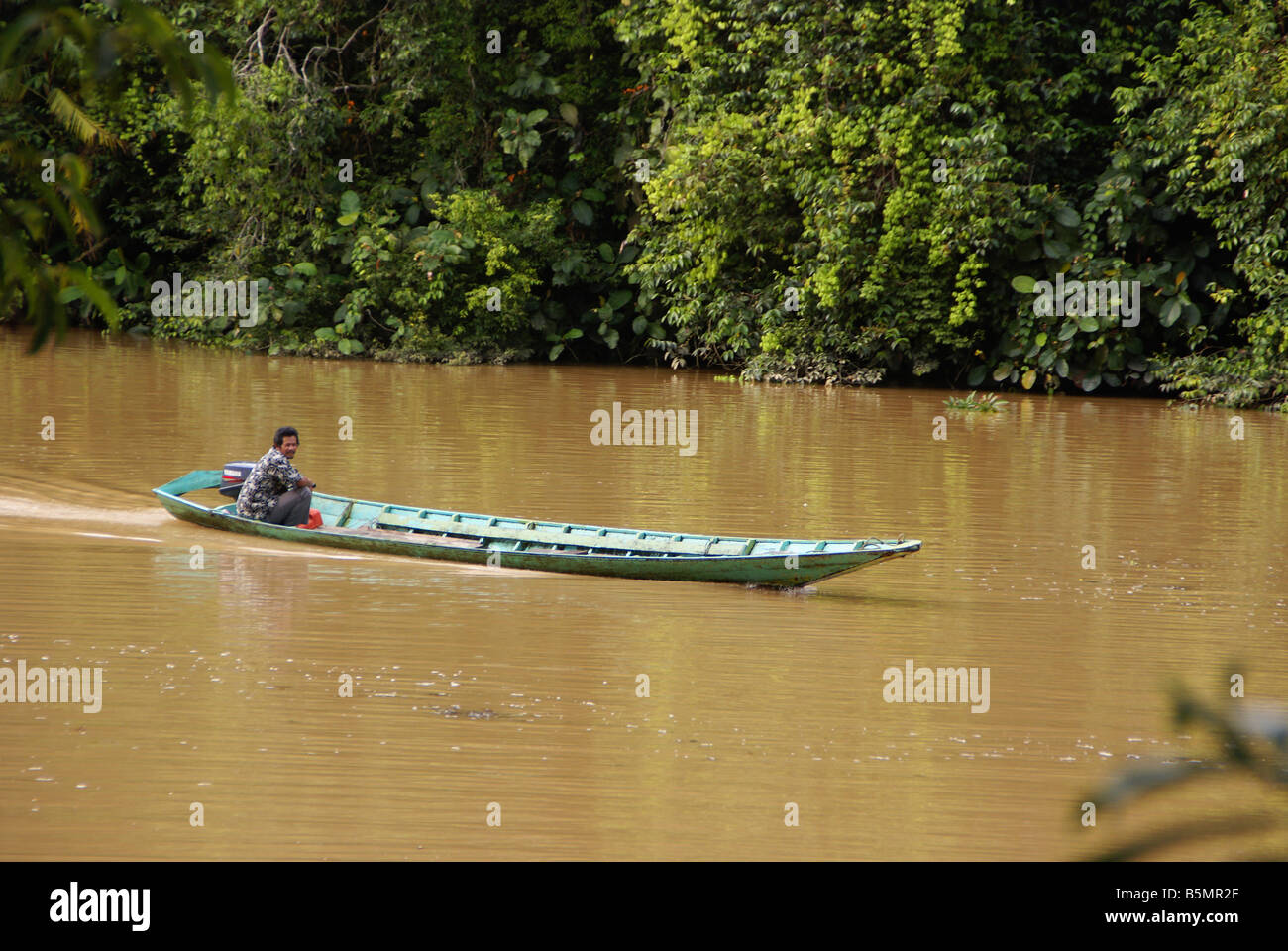 Longboat on a sarawakian river Stock Photo - Alamy