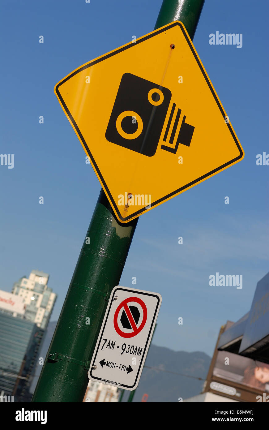 road sign with a camera main street Stock Photo - Alamy