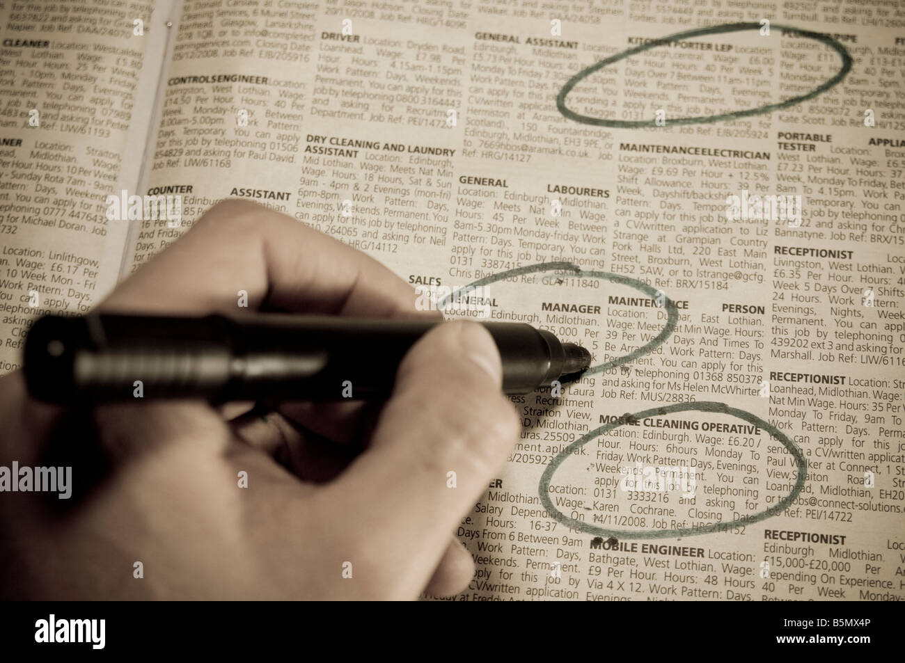 Job search section in a newspaper Stock Photo - Alamy