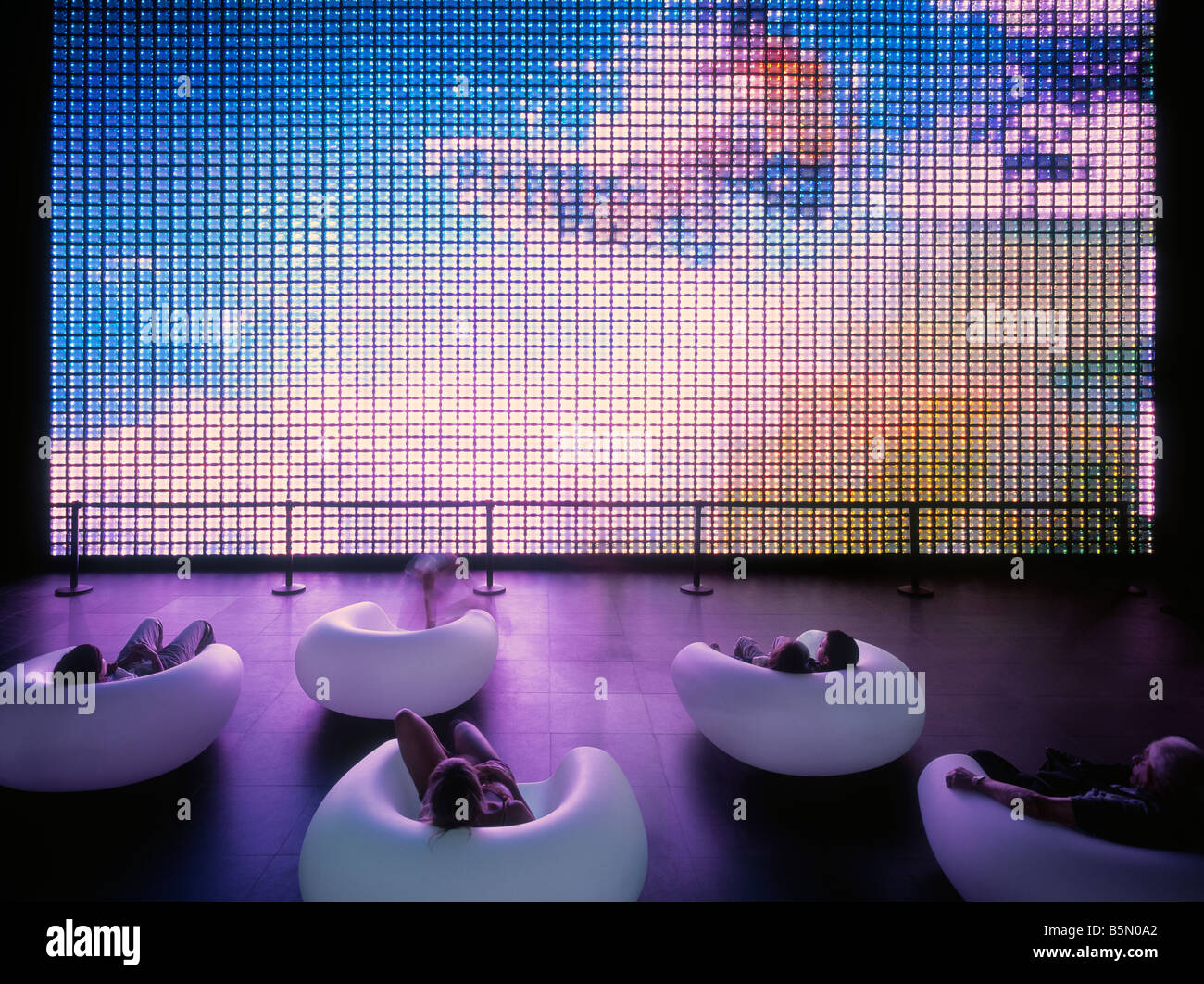 People watching informative movie at the Water Expo (long exposure ...