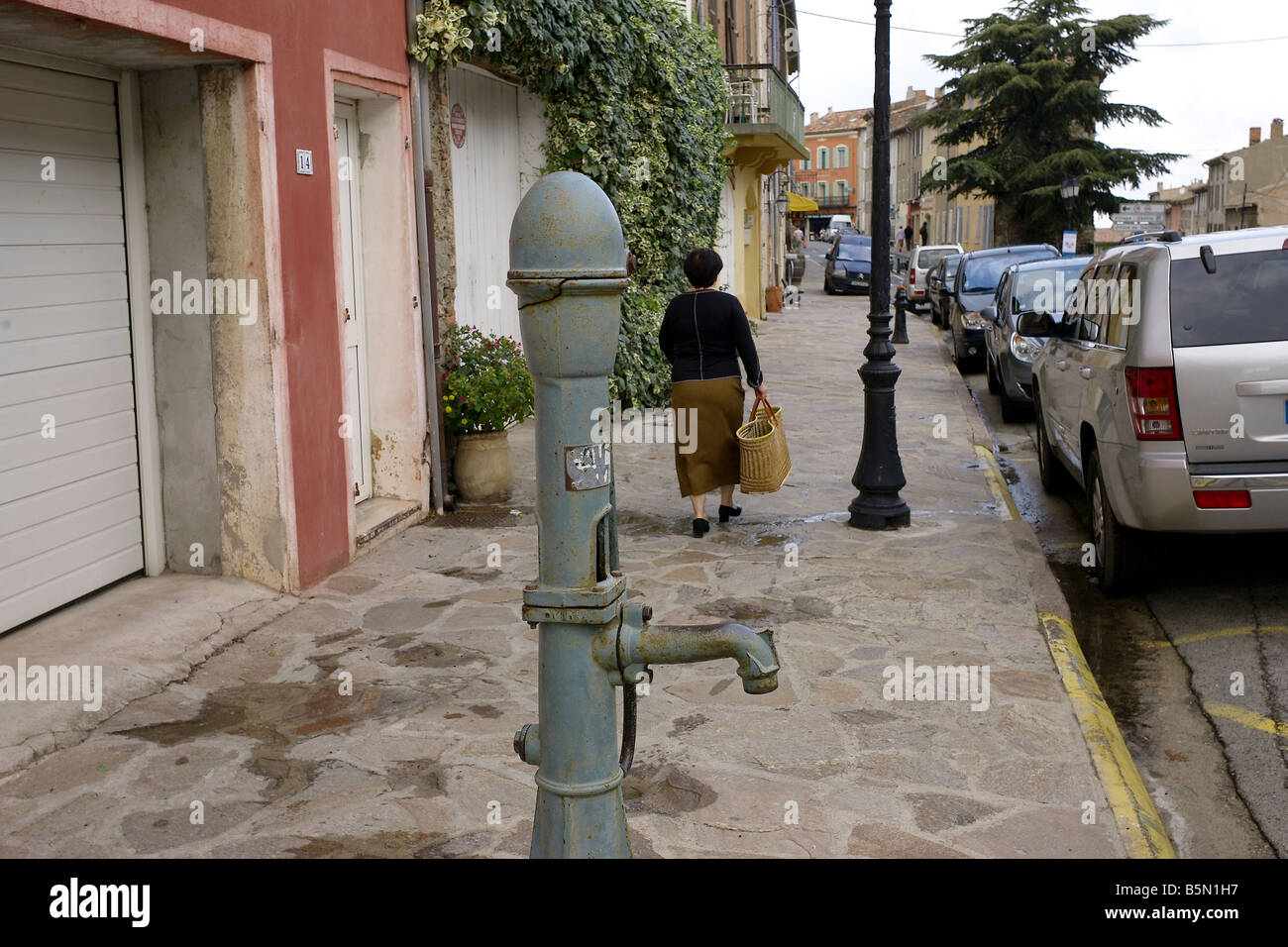 French village,water pump,rustic village,village street Stock Photo - Alamy
