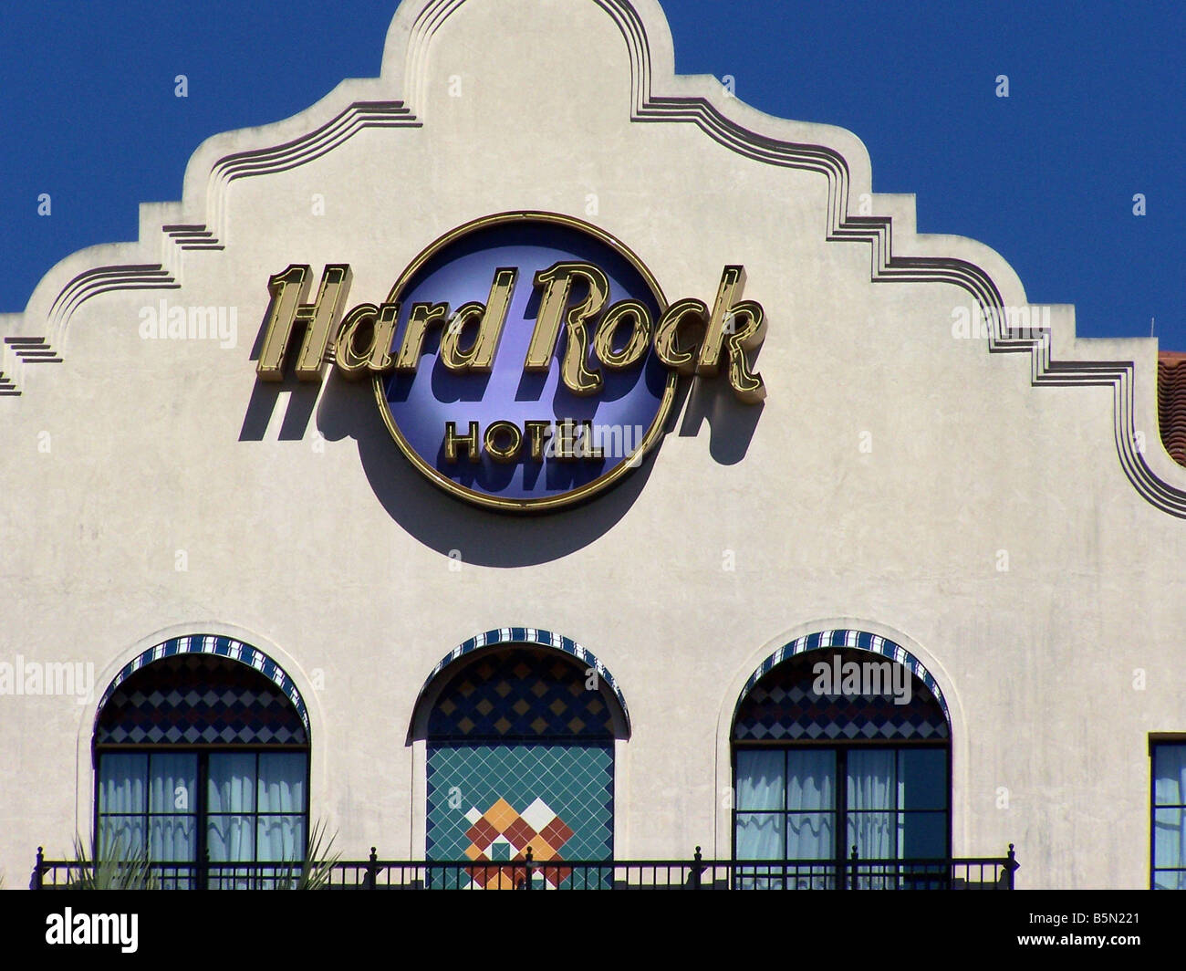 The logo on the top pinnacle of the Hard Rock Hotel in Orlando, Florida ...