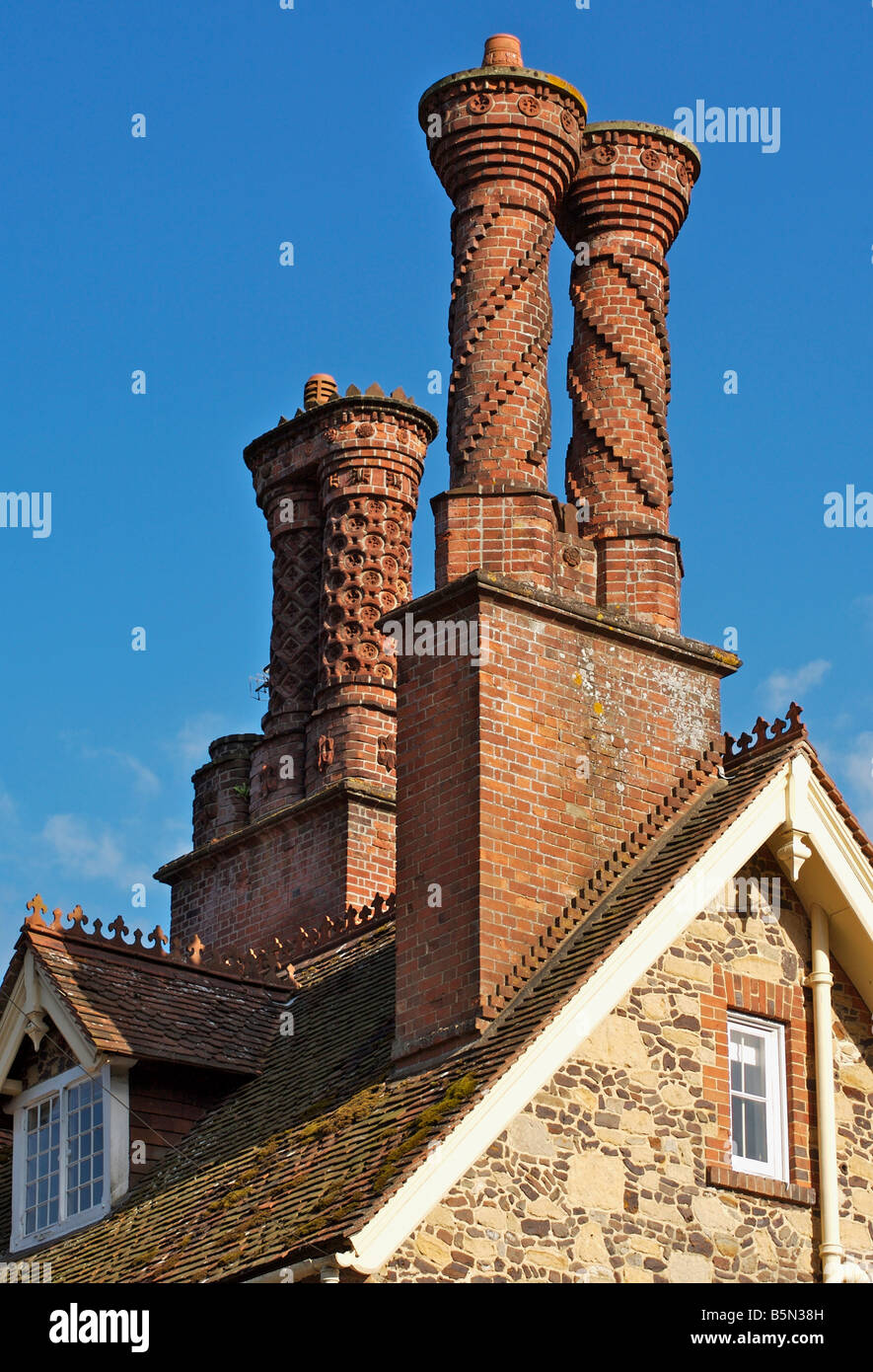 Decorative brickwork chimneys hi-res stock photography and images - Alamy