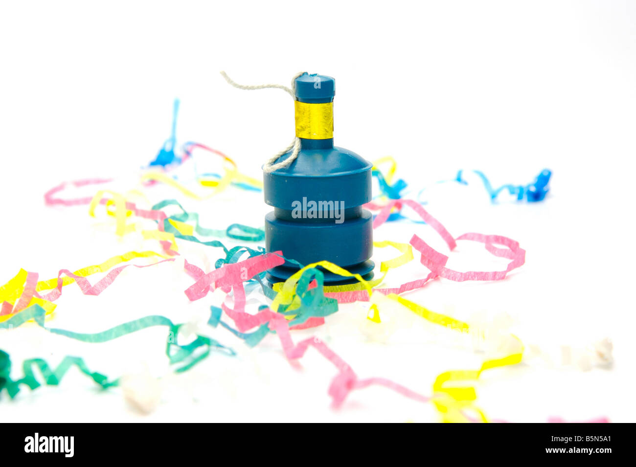 Party poppers isolated against a white background Stock Photo - Alamy