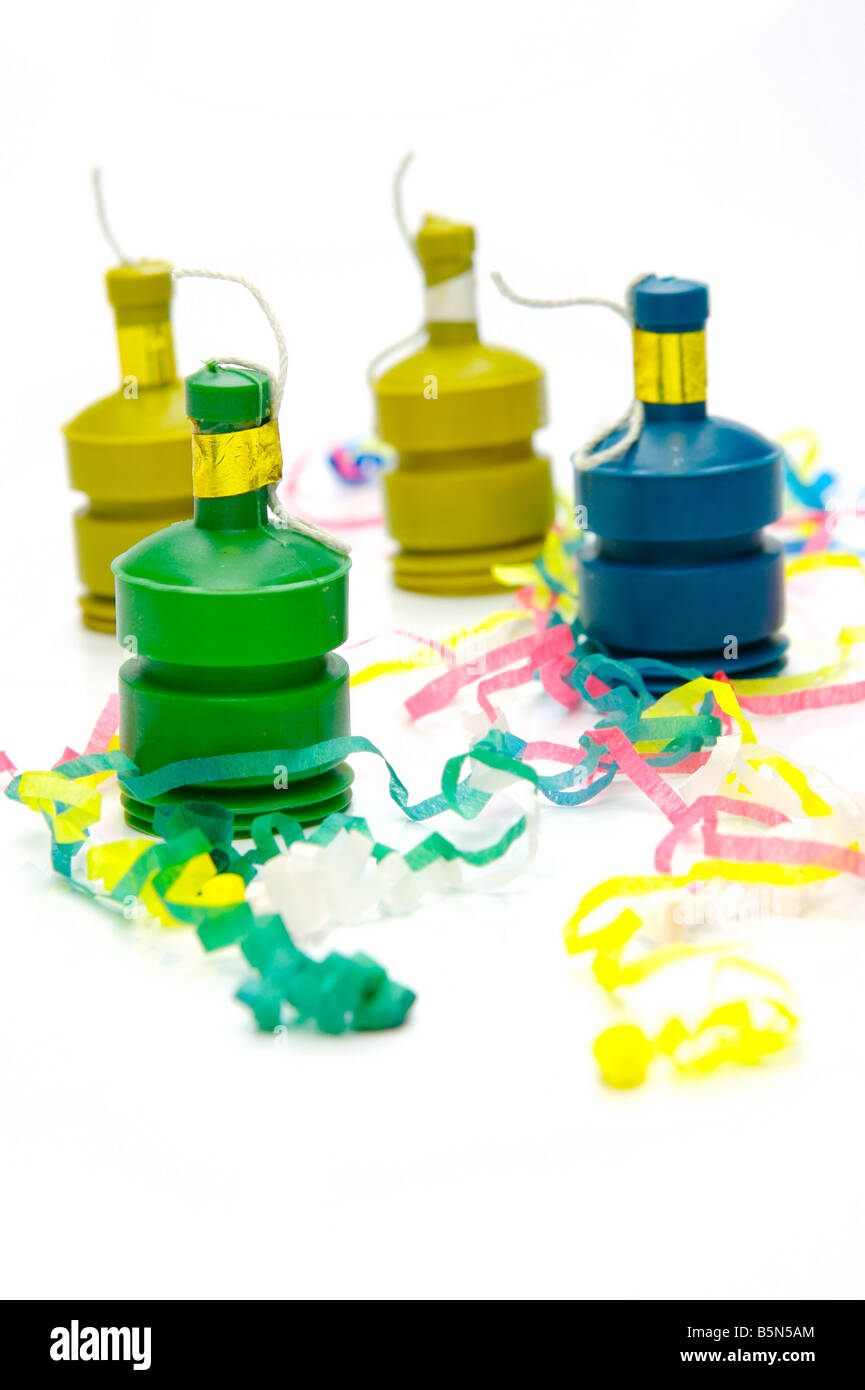 Party poppers isolated against a white background Stock Photo - Alamy