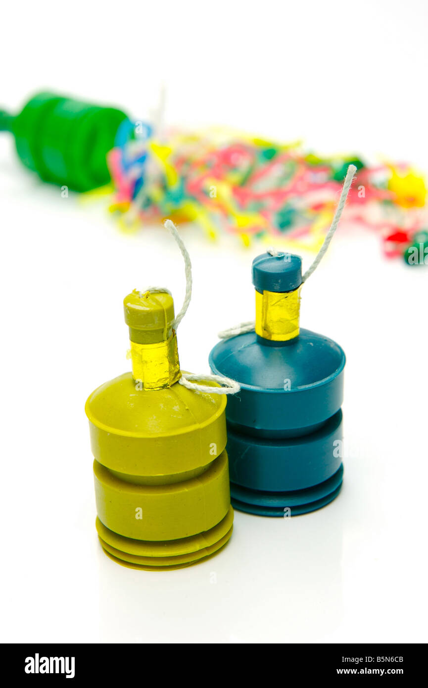 Party poppers isolated against a white background Stock Photo - Alamy