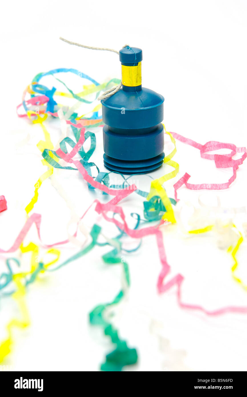 Party poppers isolated against a white background Stock Photo - Alamy