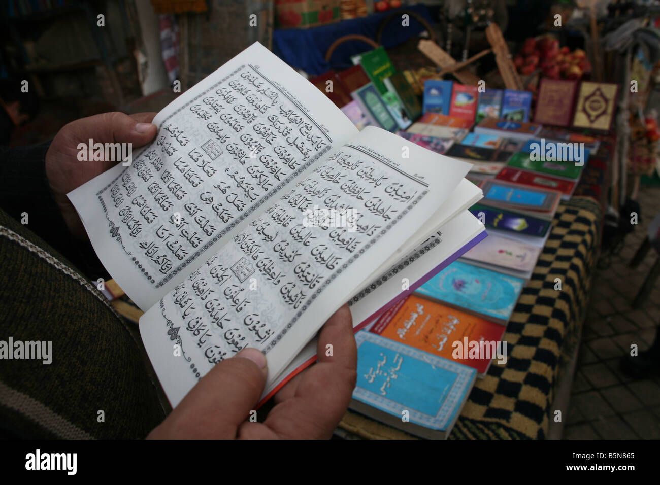 Reading religious script Stock Photo - Alamy