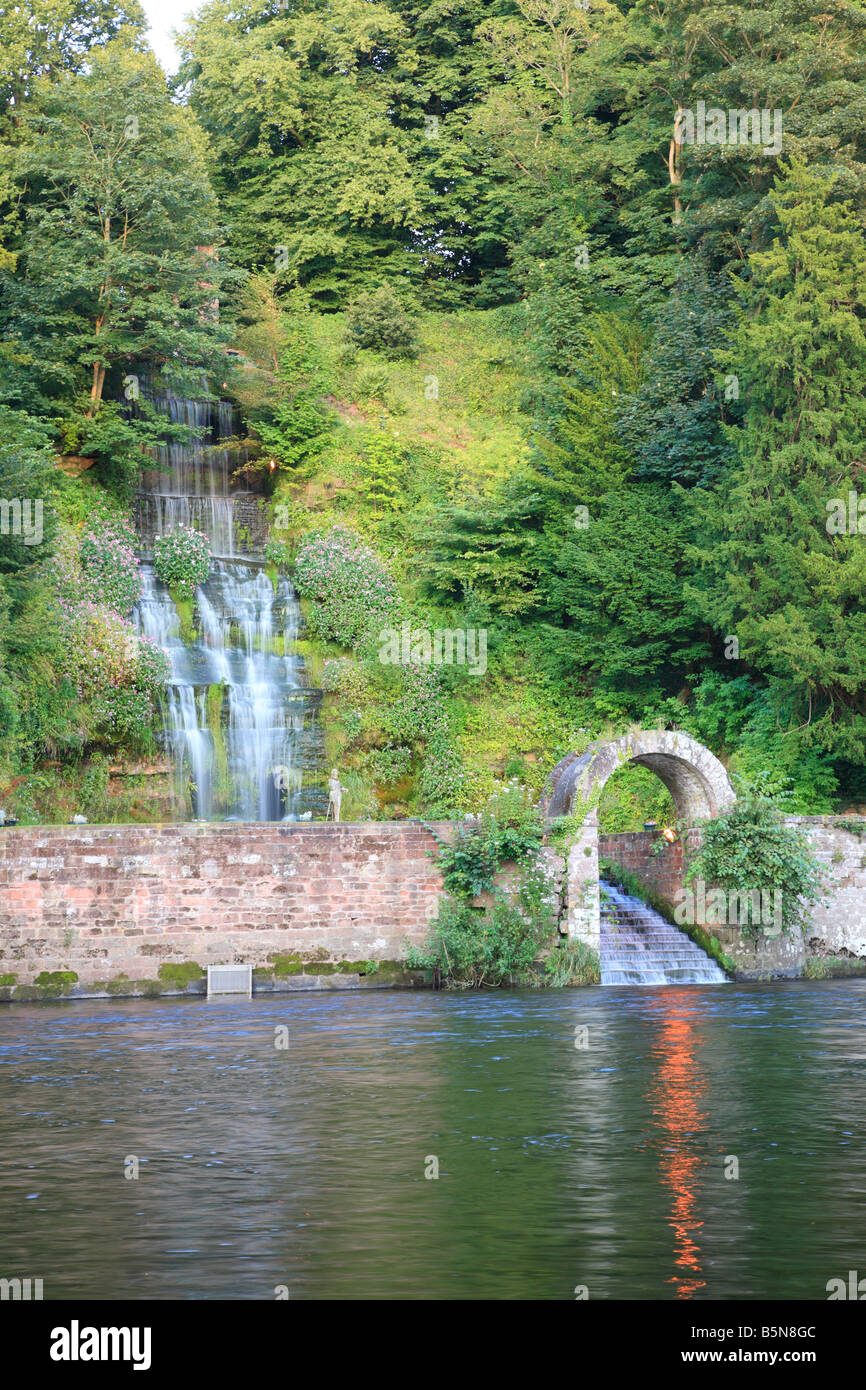 Corby Castle gardens and artificial waterfall from the river Eden ...