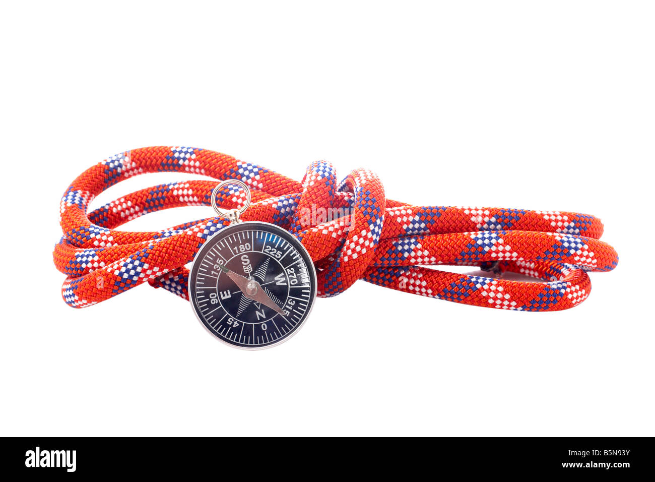 Compass and rope with knot reflected on white background Stock Photo ...