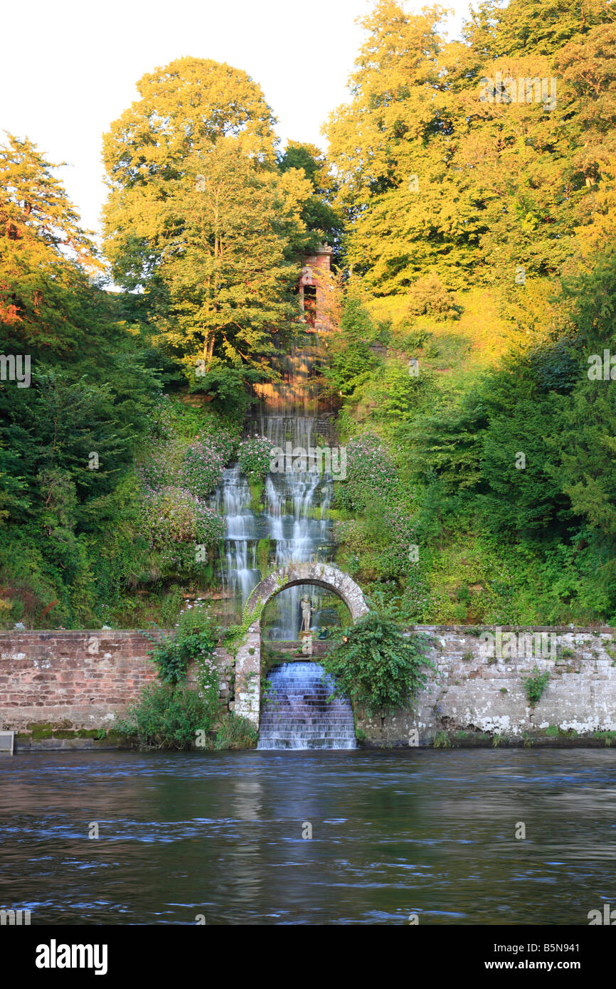 Corby Castle gardens and artificial waterfall from the river Eden ...