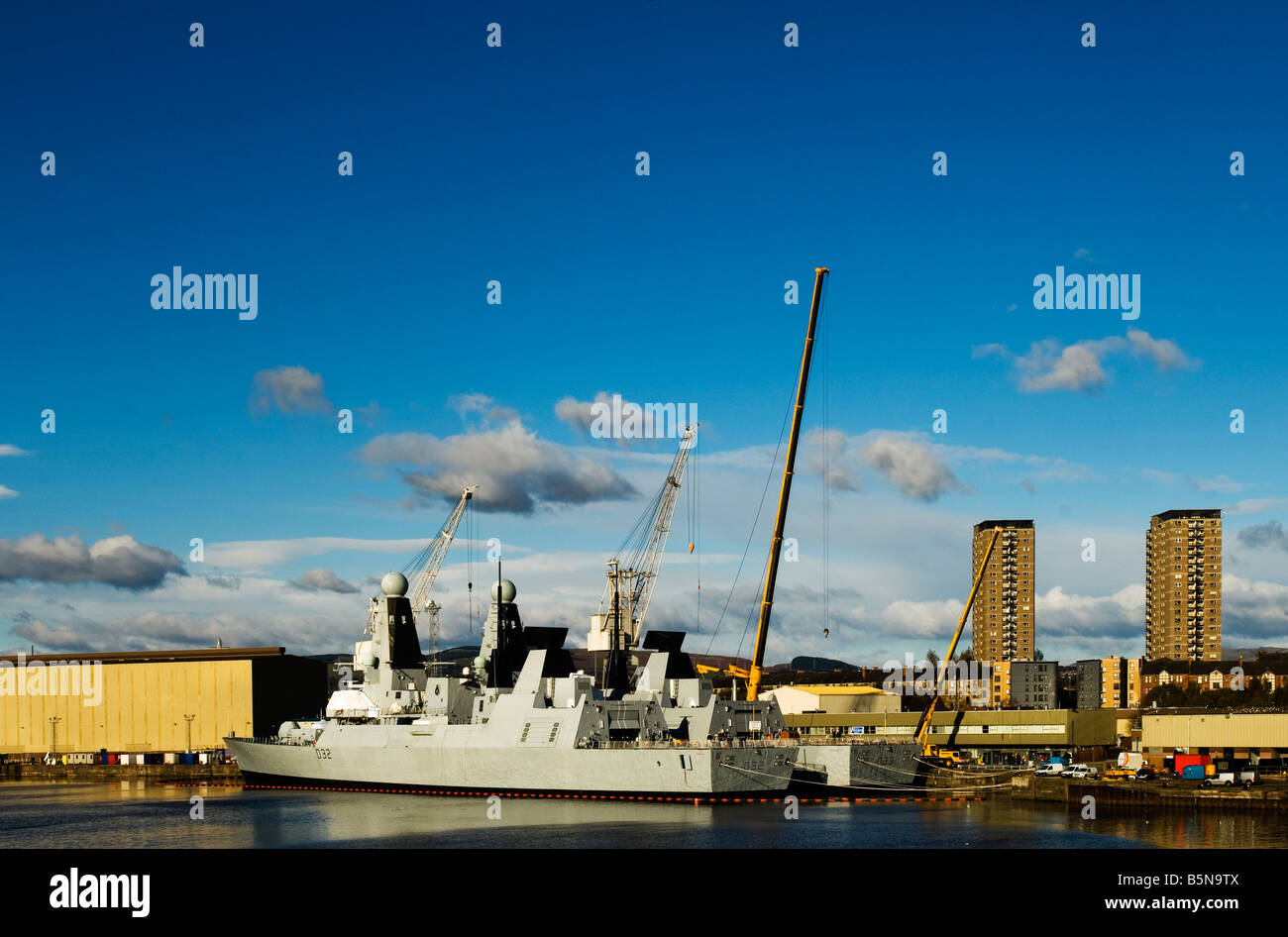 Two Type 45 frigates moored at BAE Systems shipyard on the River Clyde ...