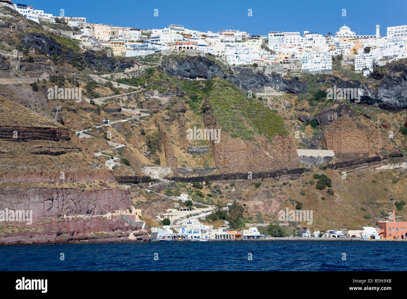 View of Fira town from the sea Stock Photo - Alamy