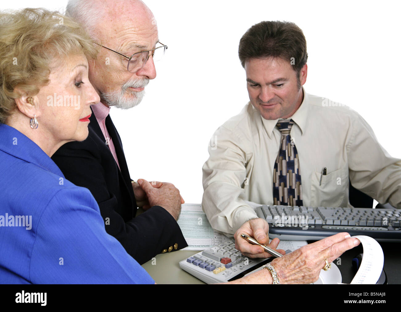 A senior couple going over their finances with an accountant Isolated ...