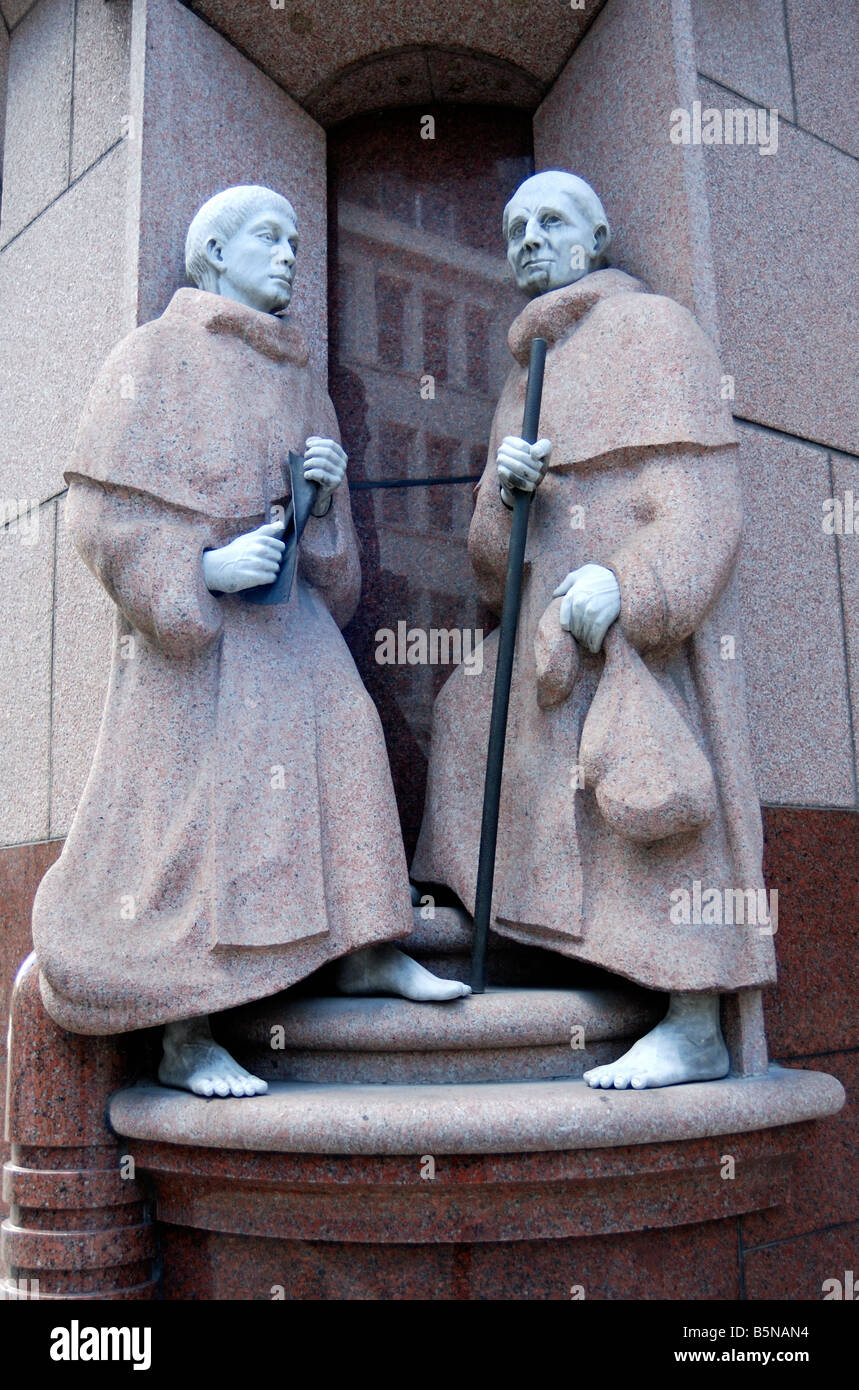 Statue of two monks Stock Photo - Alamy
