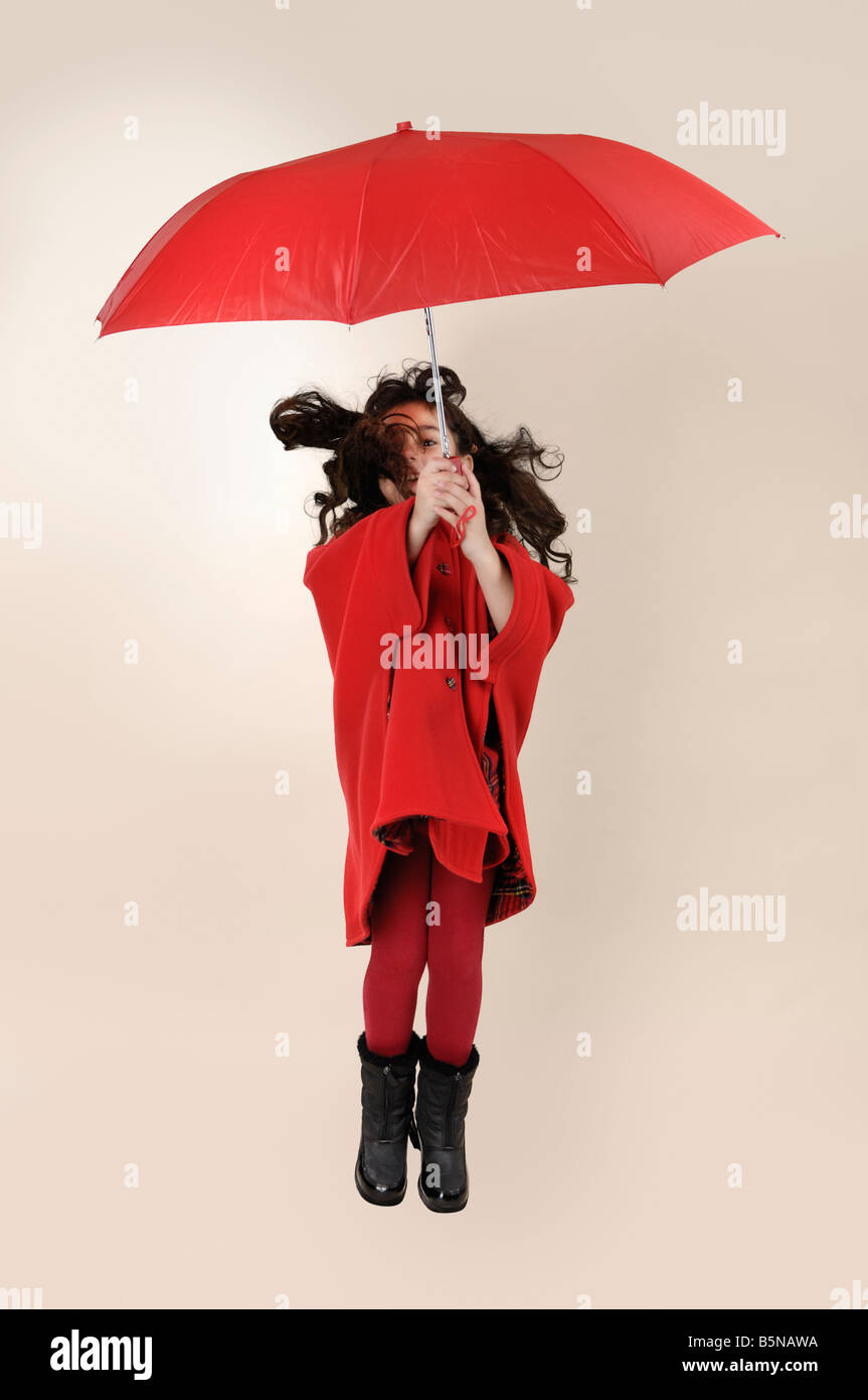 Child wind umbrella hi-res stock photography and images - Alamy