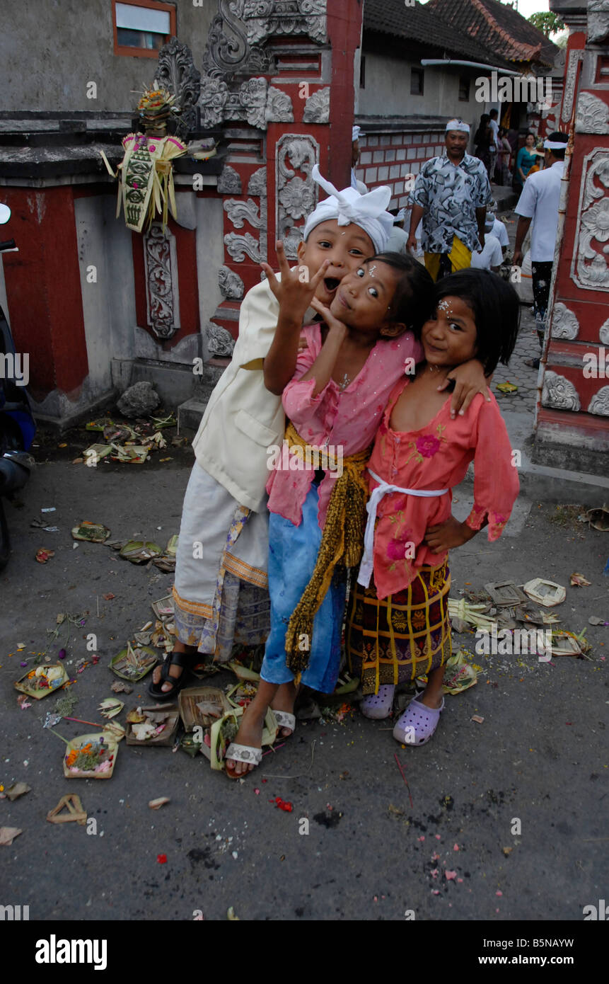 Balinese kids with traditional dress at temple celebration Stock Photo ...