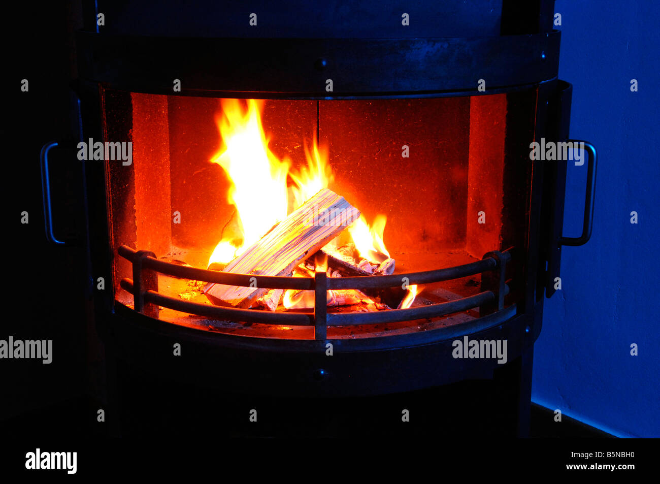 Fire in a stove Stock Photo - Alamy
