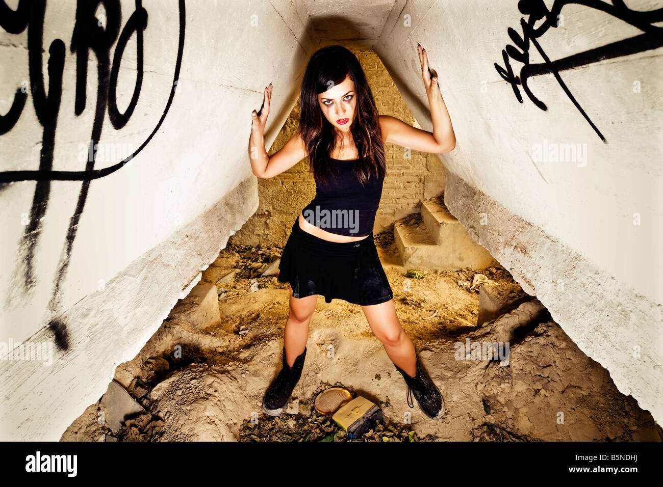 Rebel young girl posing in her hiding place Stock Photo - Alamy