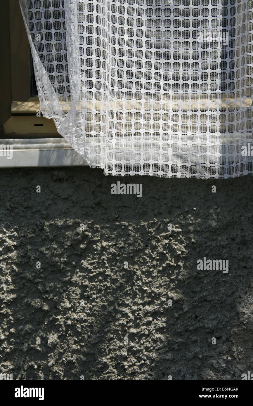 detail of net curatins on house window Stock Photo - Alamy