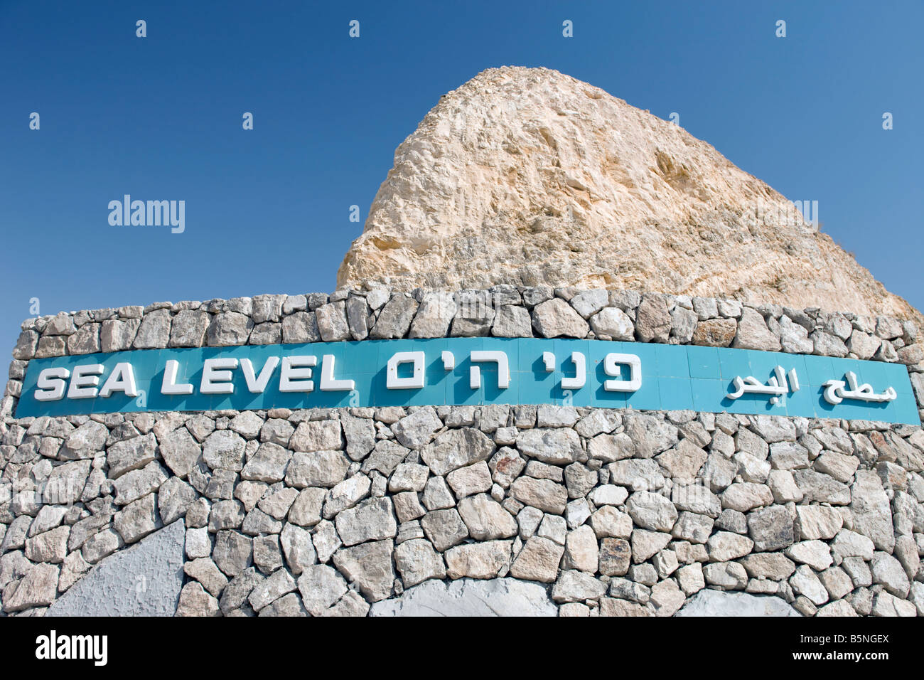 MEAN SEA LEVEL SIGN ON CLIFFS ABOVE DEAD SEA WEST BANK ISRAEL Stock ...