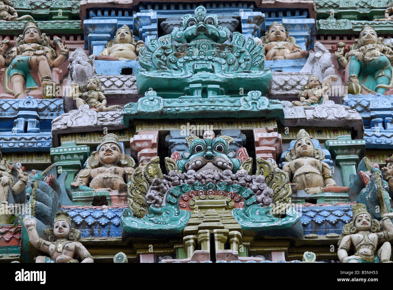 INTRICATE CARVINGS ON THE GOPURAM OF A TEMPLE IN TAMILNADU Stock Photo ...