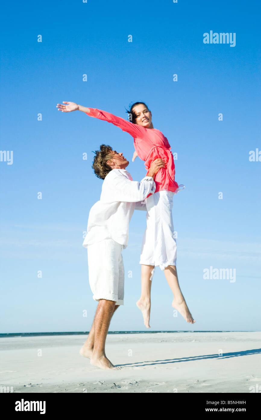 couple dancing on beach Stock Photo - Alamy