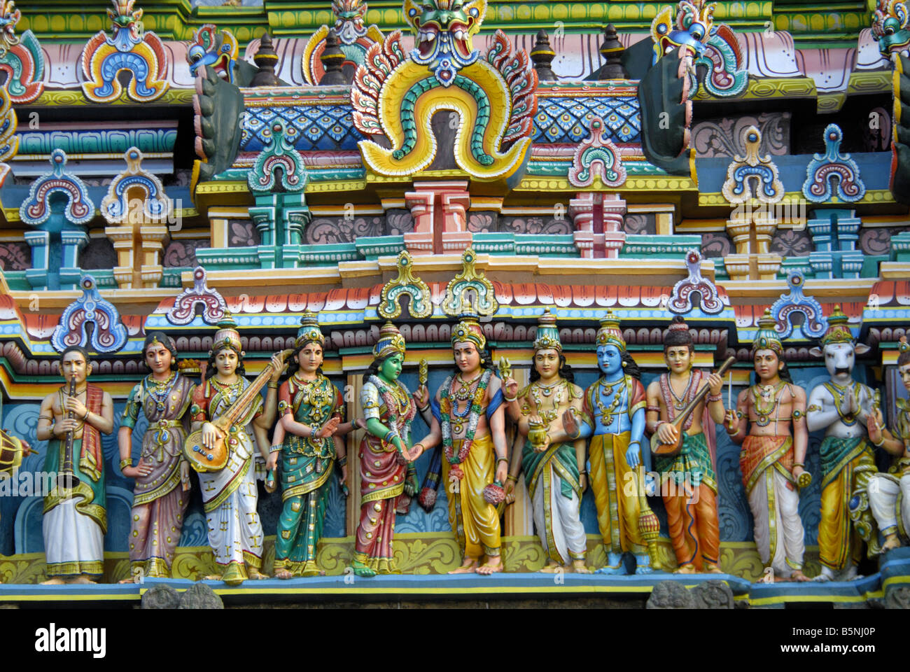 INTRICATE CARVING WORK ON THE GOPURAM OF TEMPLE IN TAMILNADU Stock ...