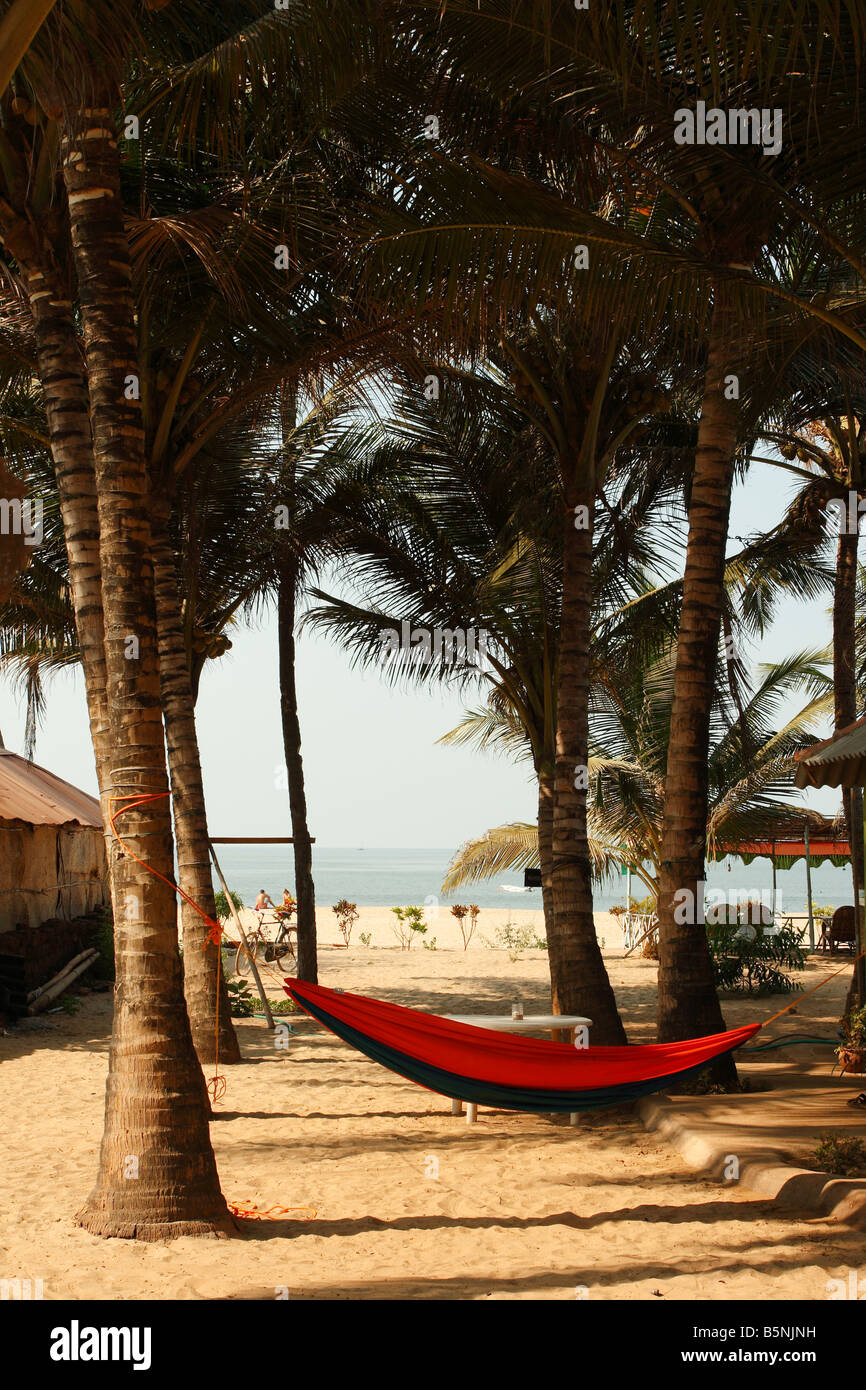 Hammock between palm trees on the beach of Patnem Goa India Stock Photo ...