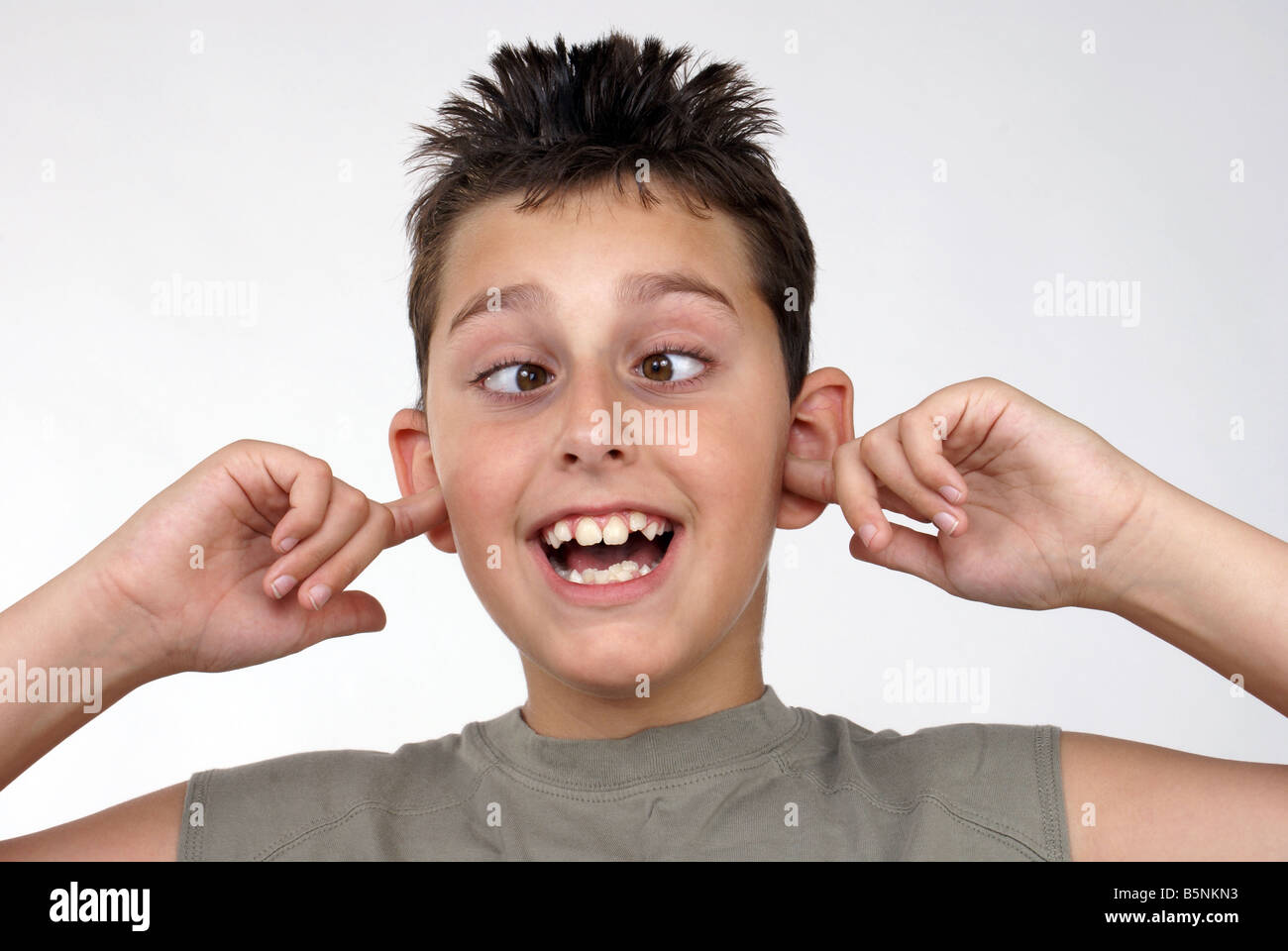 Cross eyed child funny face hi-res stock photography and images - Alamy