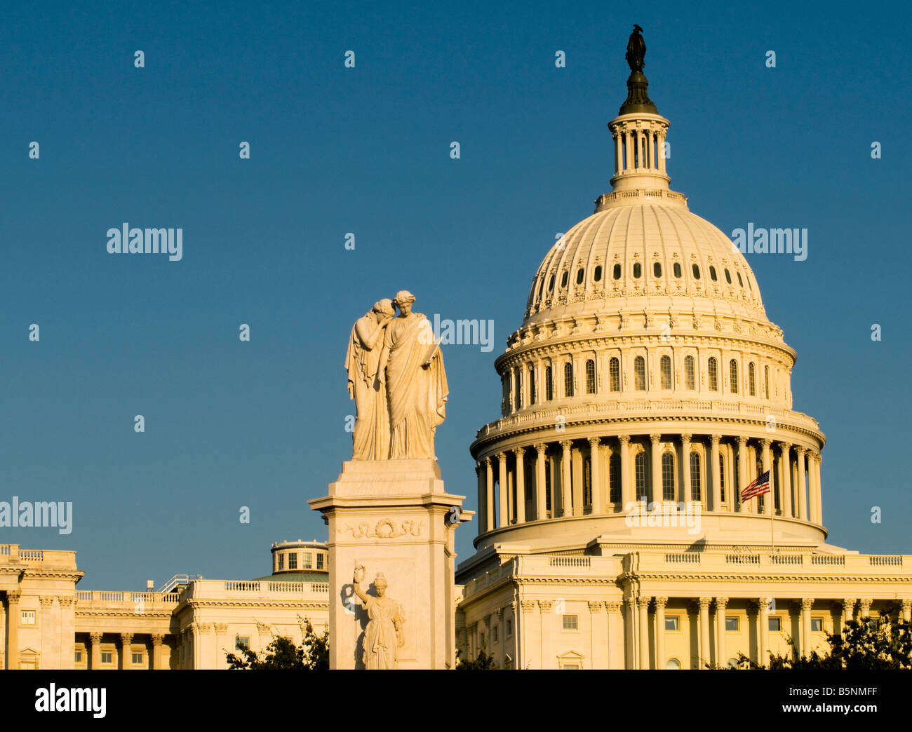 Capitol Building in Washington DC enhanced with the warm golden glow of ...