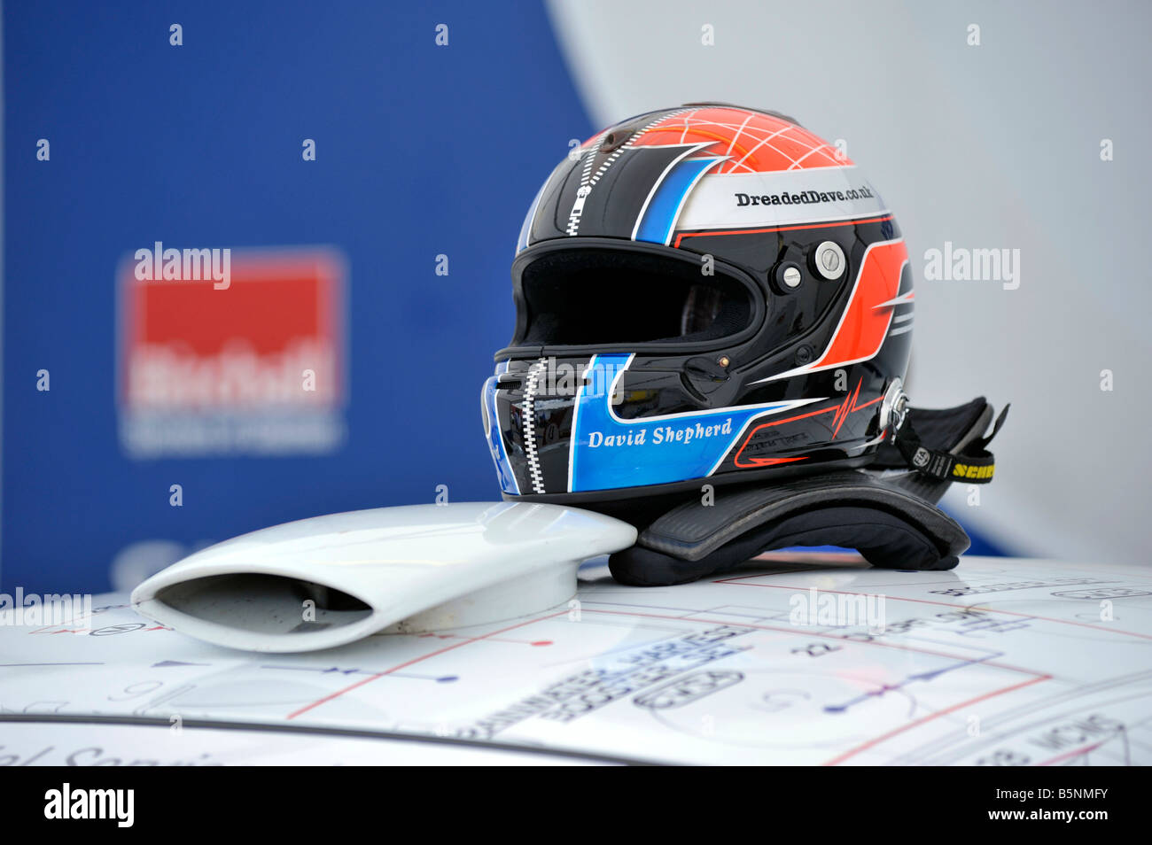 safety crash helmet sitting on top of touring racing car Stock Photo ...
