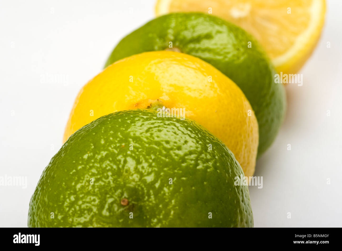 Lemon & Limes in a row Stock Photo - Alamy