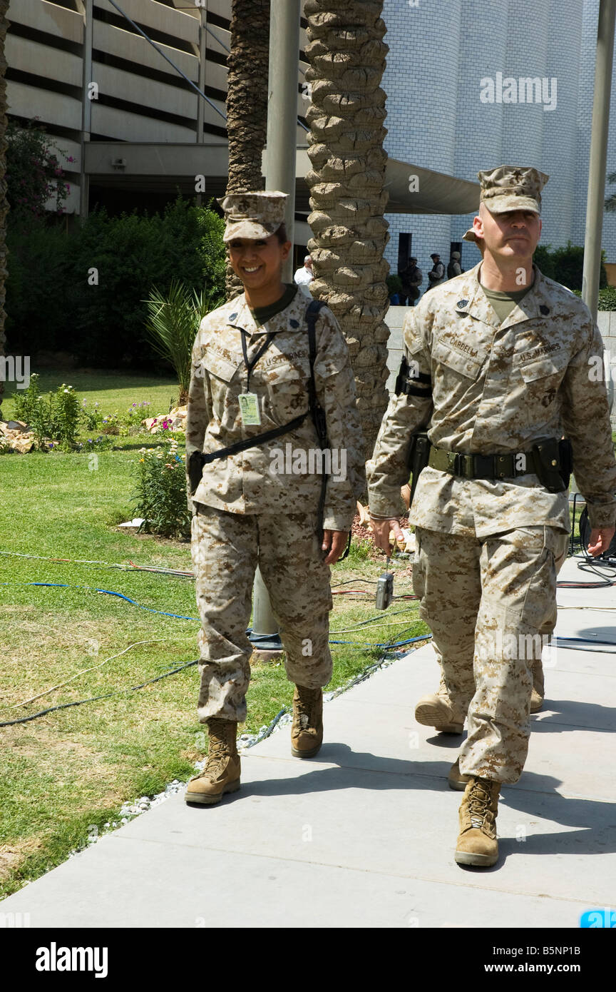 male and female american Marines walking toward camera near the ...