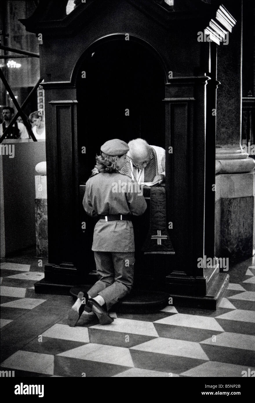 White And Black Catholic Priest